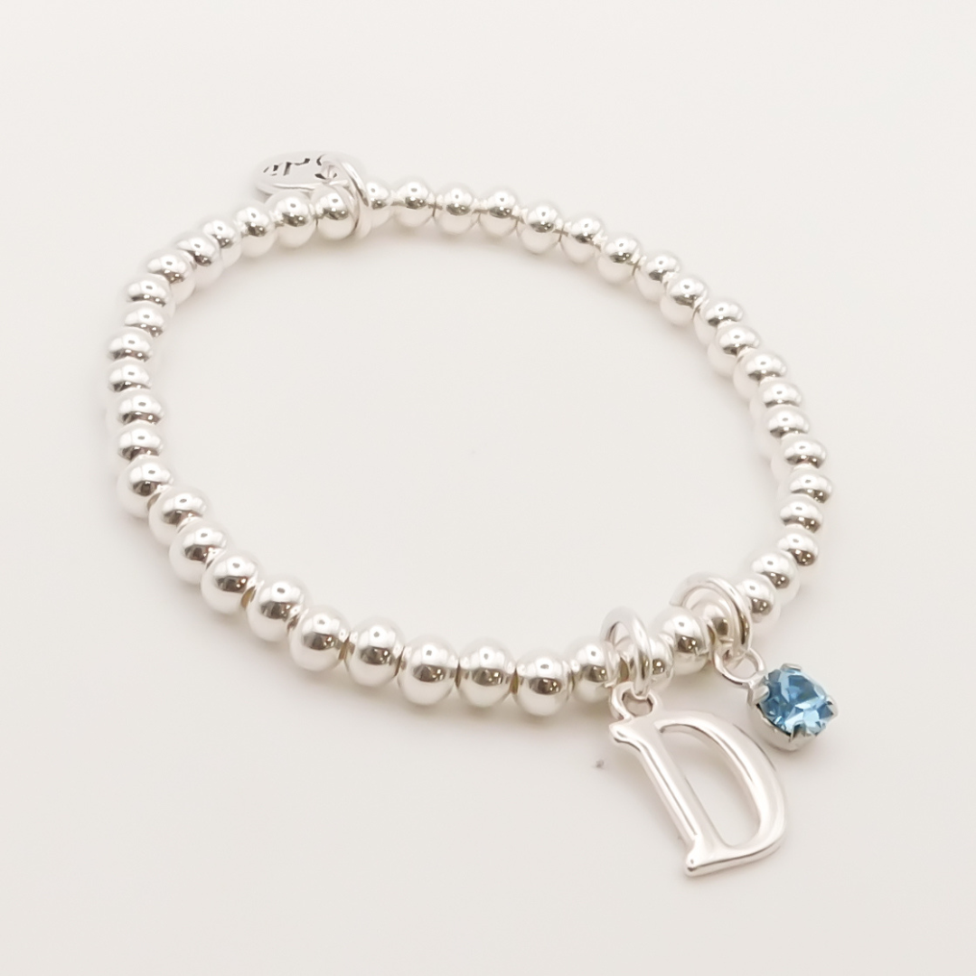 The Meaning Behind March Birthstone – Orli Jewellery